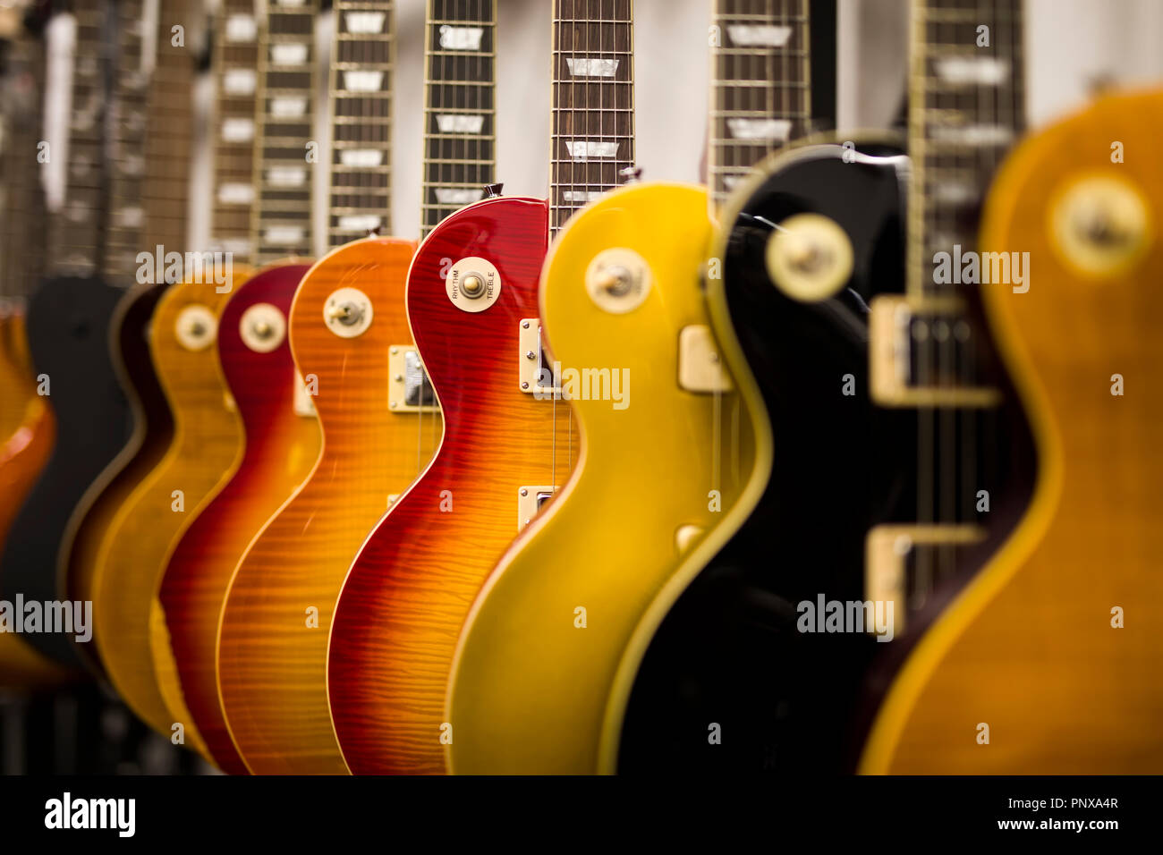 Row of guitars hi-res stock photography and images - Alamy