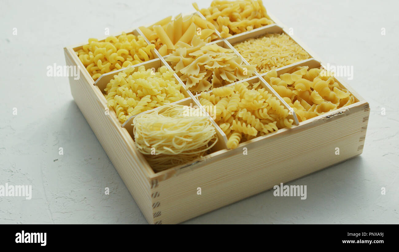 Different kind of macaroni in box Stock Photo - Alamy