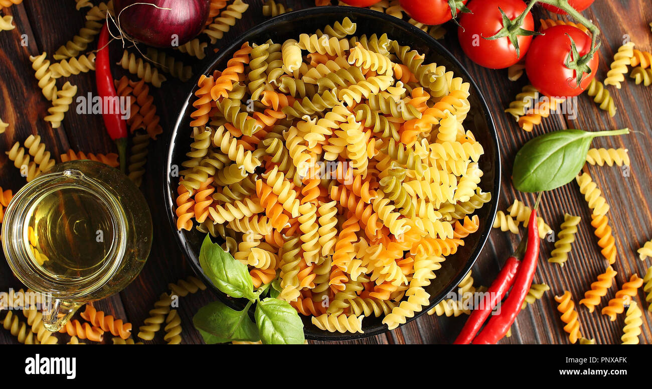 Bowl of uncooked pasta from above Stock Photo - Alamy