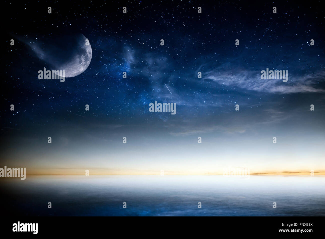 Calm sea sunset over night sky with stars and moon. Moon on this image ...