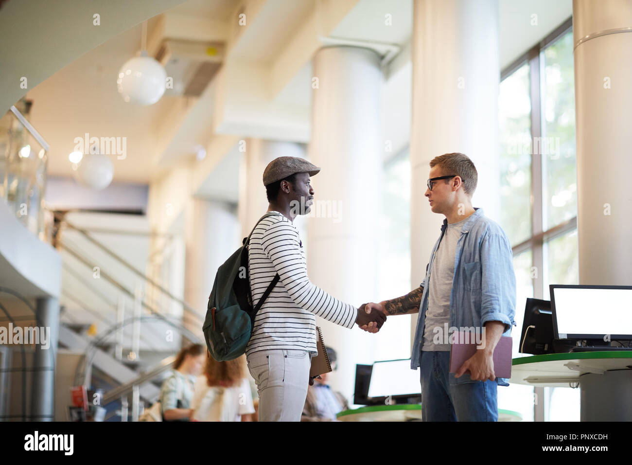 Friendship College Handshake High Resolution Stock Photography and ...
