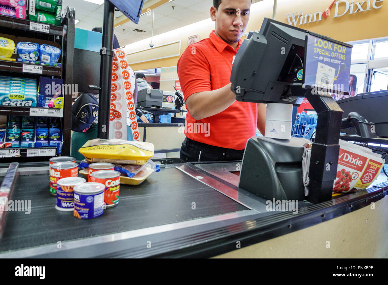 Cashier In Grocery Store, Male High Resolution Stock Photography and ...