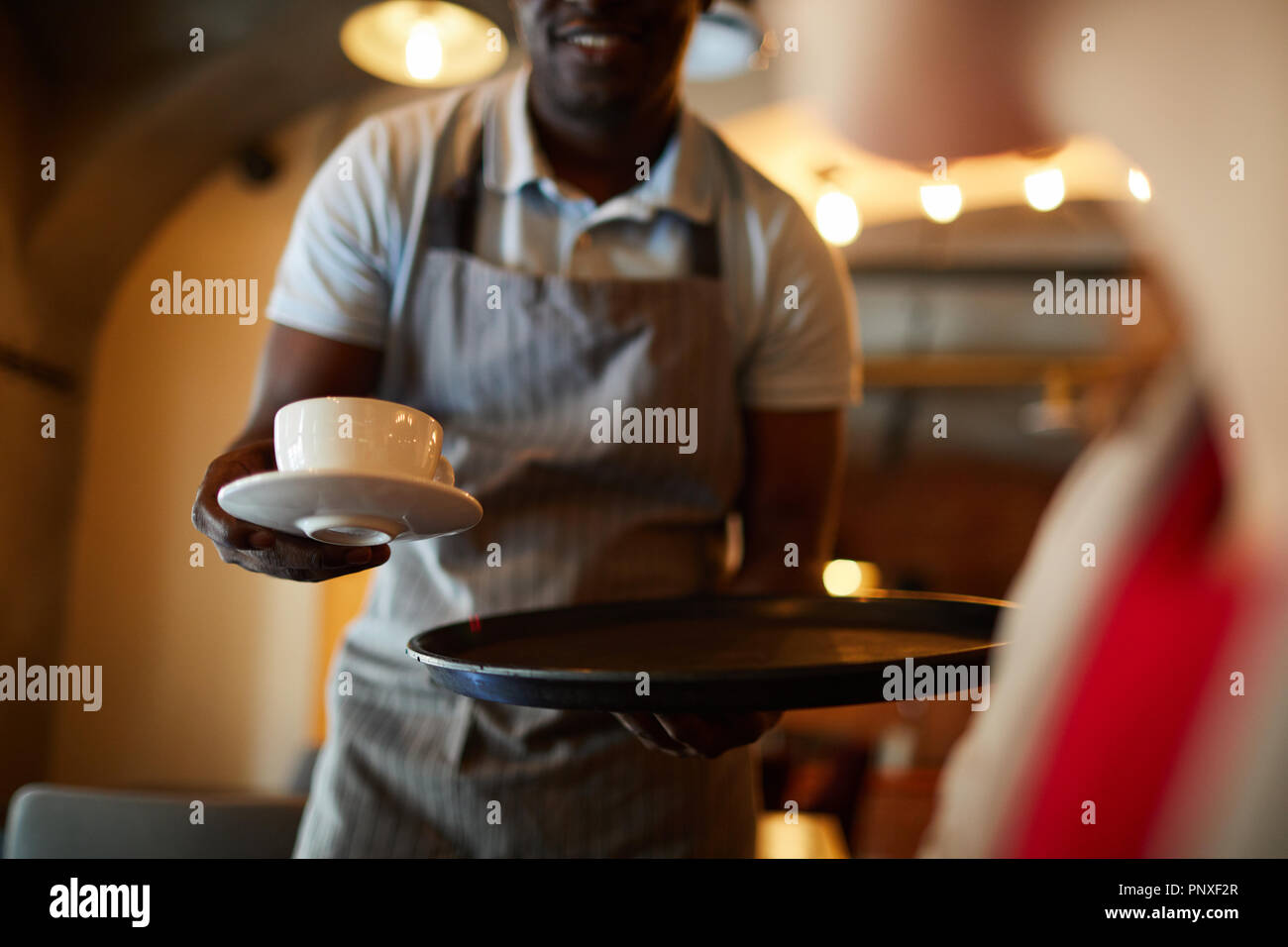 Carrying tea tray hi-res stock photography and images - Alamy