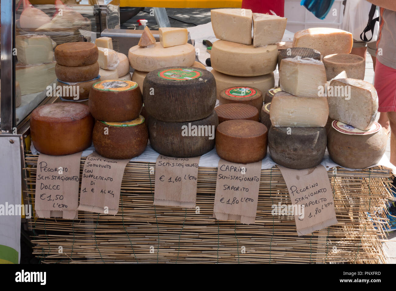 Display of cheeses on market stall Costa Rei Sardinia Stock Photo - Alamy