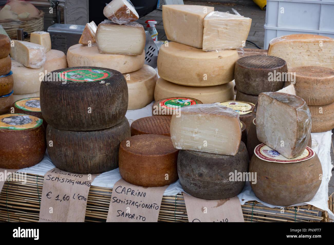 Display of cheeses on market stall Costa Rei Sardinia Stock Photo - Alamy