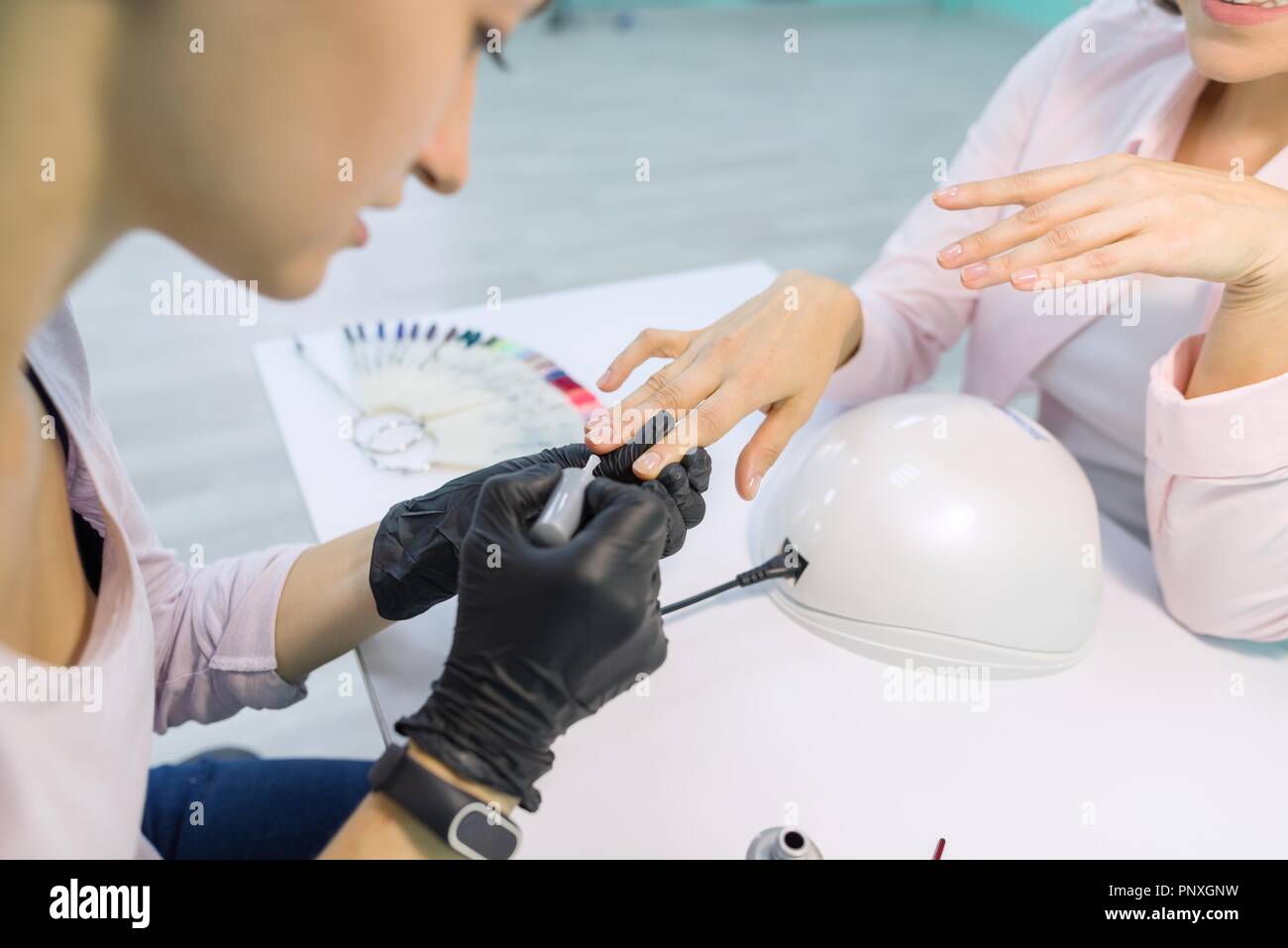 Girl Doing Nails High Resolution Stock Photography and Images - Alamy