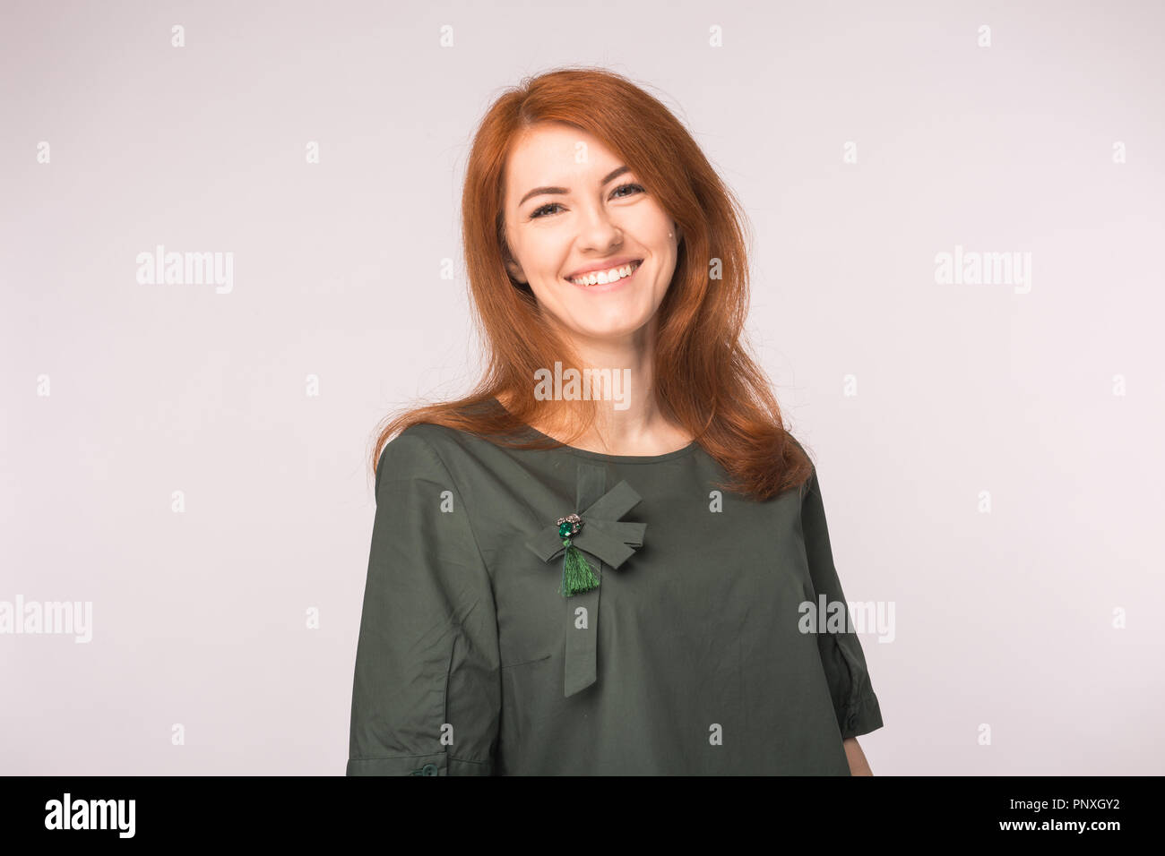 Fashion and people concept - Portrait of happy ginger woman smiling ...