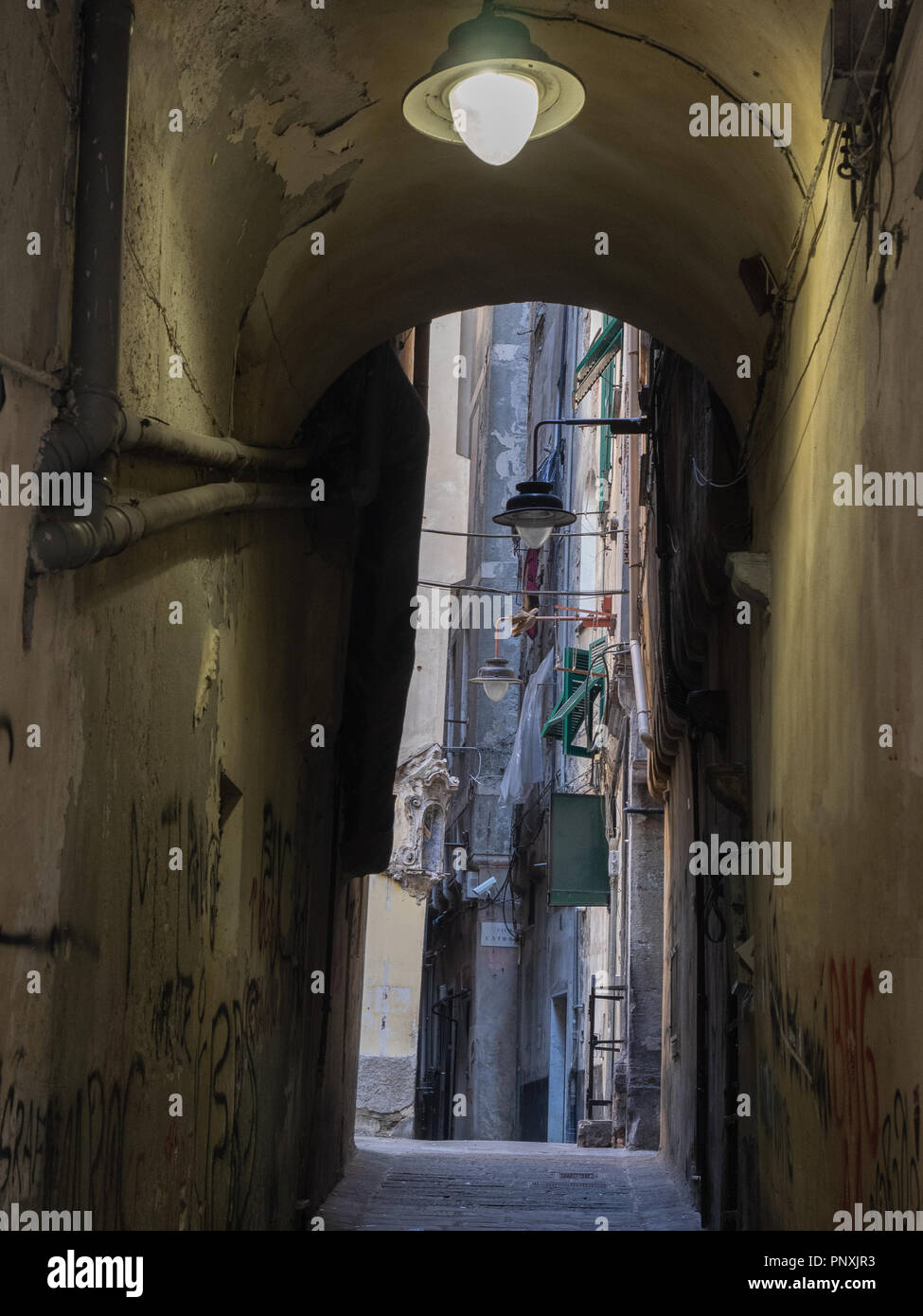 small illuminated little tunnel to cross to visit the lanes of Genoa ...