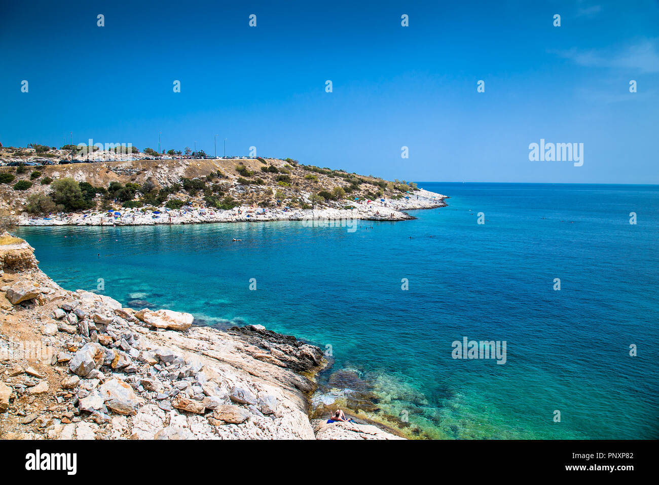 ATHENS, GREECE - JUNE 19, 2016: People on the Voullagmeni beach in ...