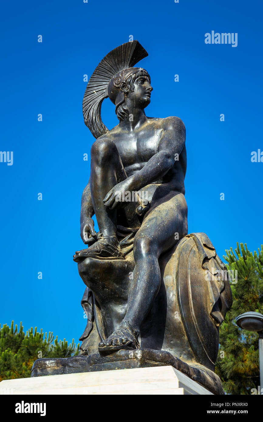 Black granite statue of soldiers with a feather at ancient Agora ...