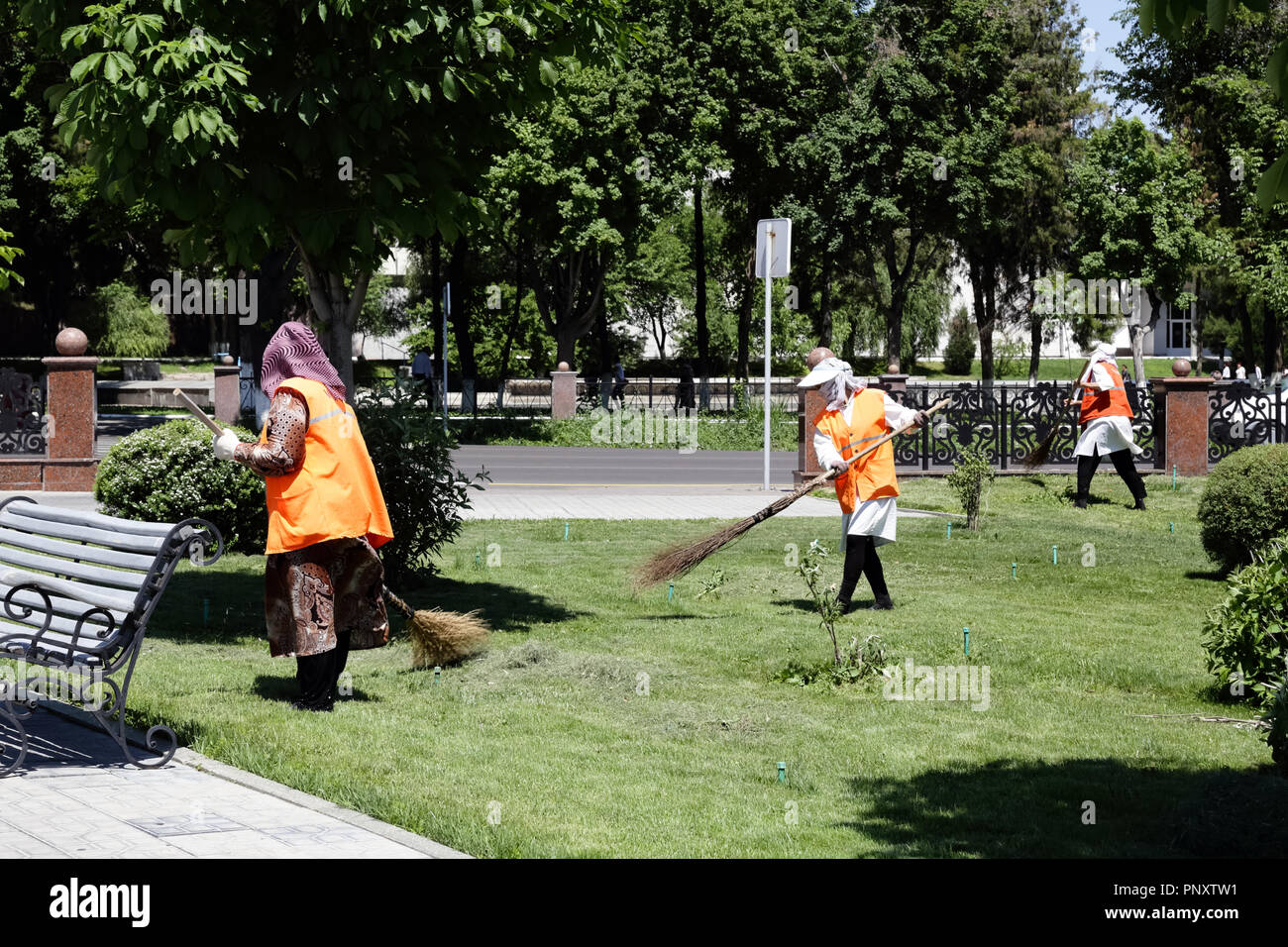 Tashkent, Uzbekistan - May 12, 2017: City municipal workers cleaning ...