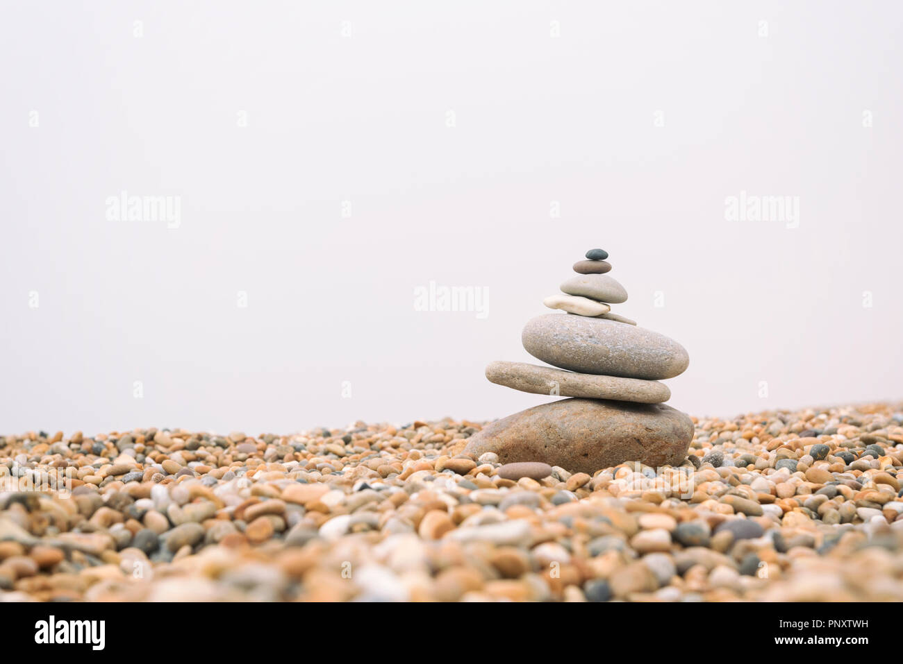 Stack of pebbles on the beach Stock Photo - Alamy