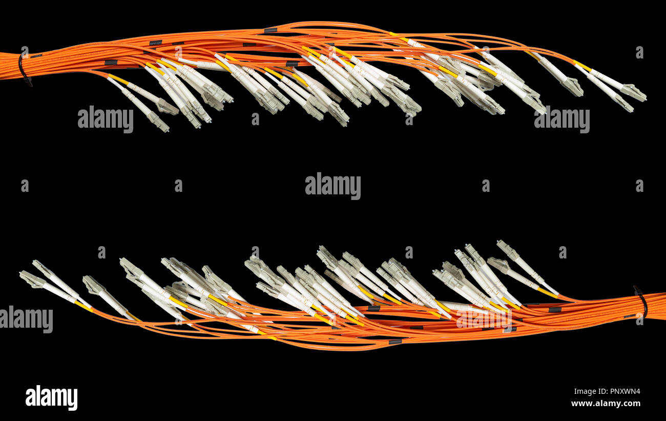 Bunch of fiber optic cables and connectors on black background with ...