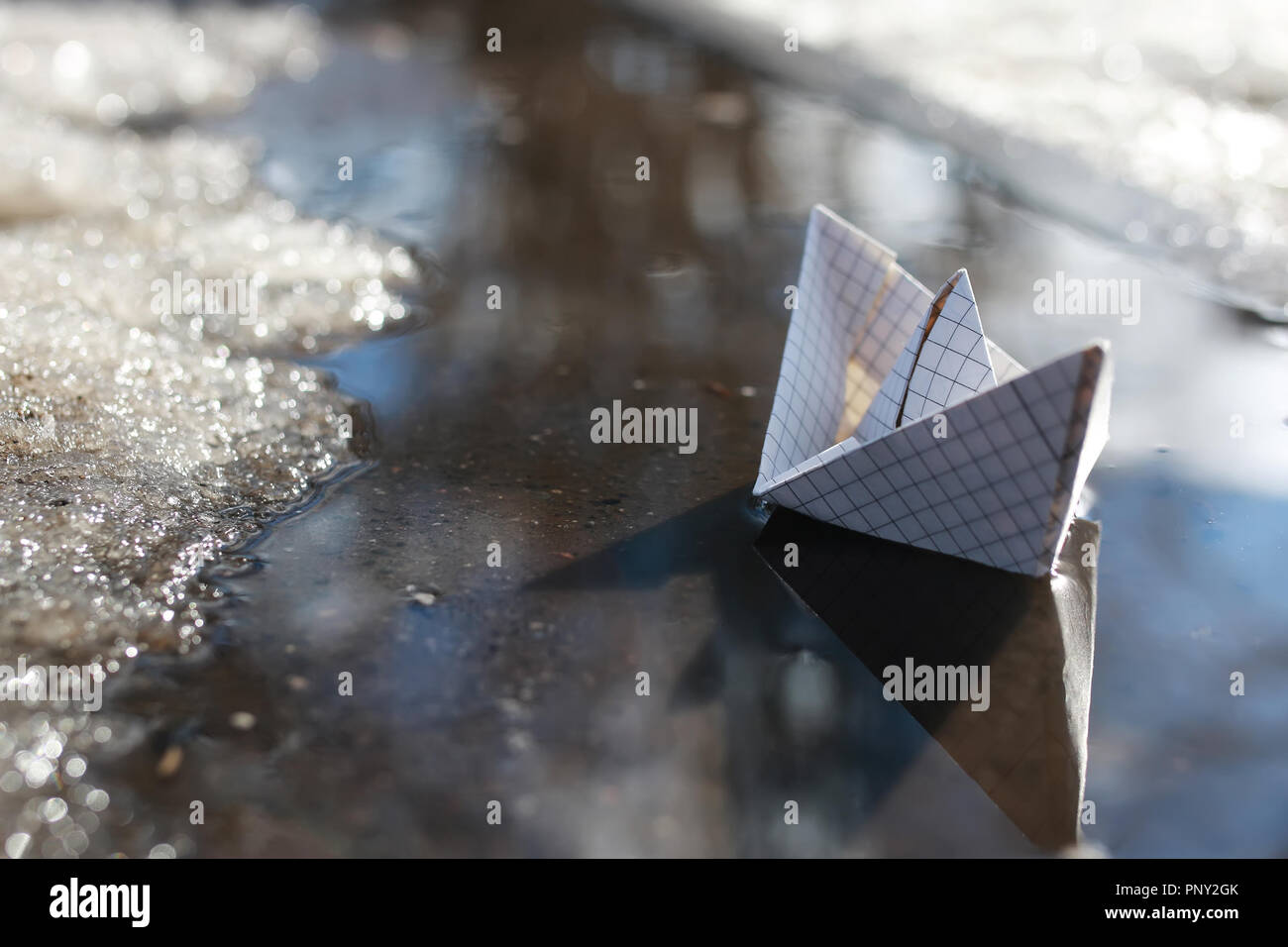 paper boat in a pool Stock Photo - Alamy