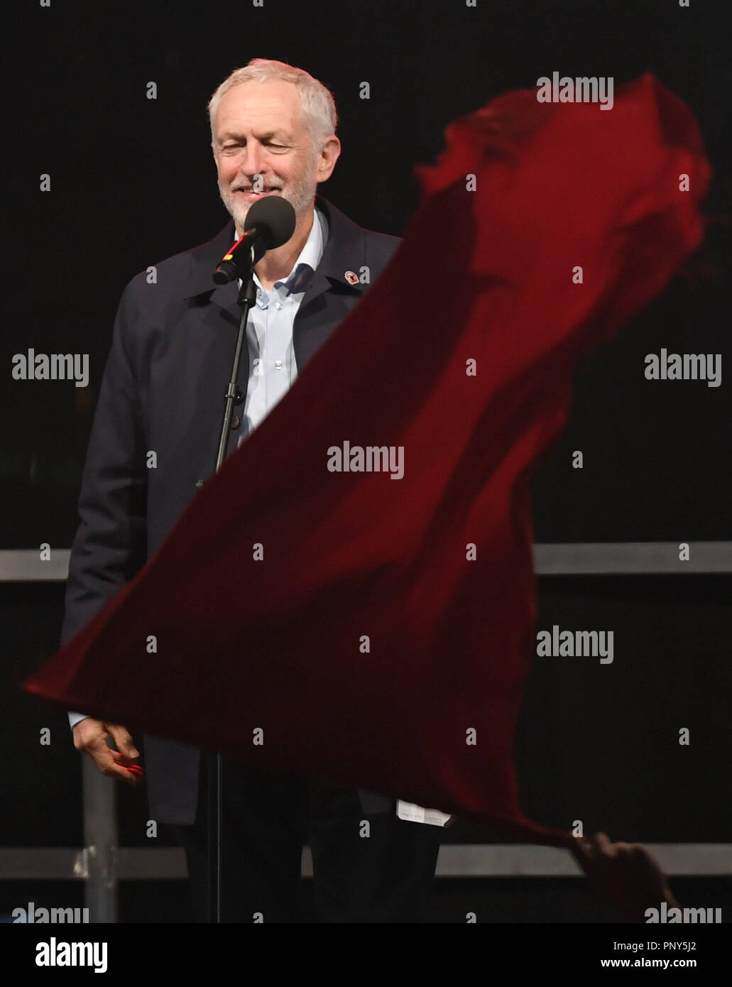 A red flag flies as Labour leader Jeremy Corbyn speaks at a rally at ...