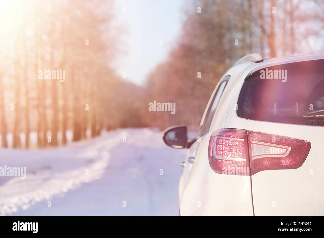 Winter road and a car Stock Photo - Alamy