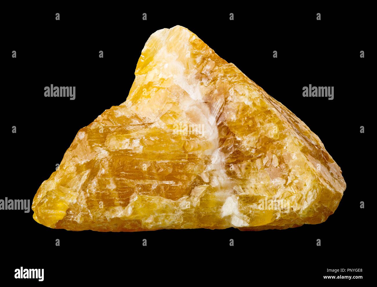 Raw, uncut yellow calcite (CaCO3) from Mexico isolated on black ...