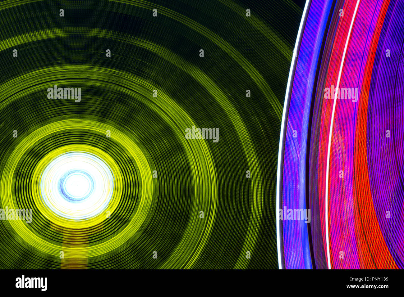 Amusement park long exposure photo Stock Photo - Alamy