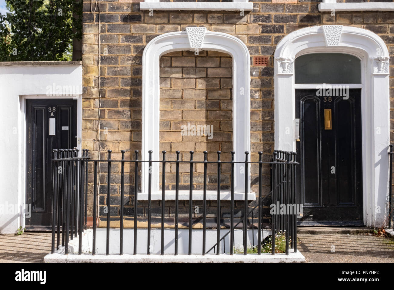 London house with bricked up window Stock Photo - Alamy