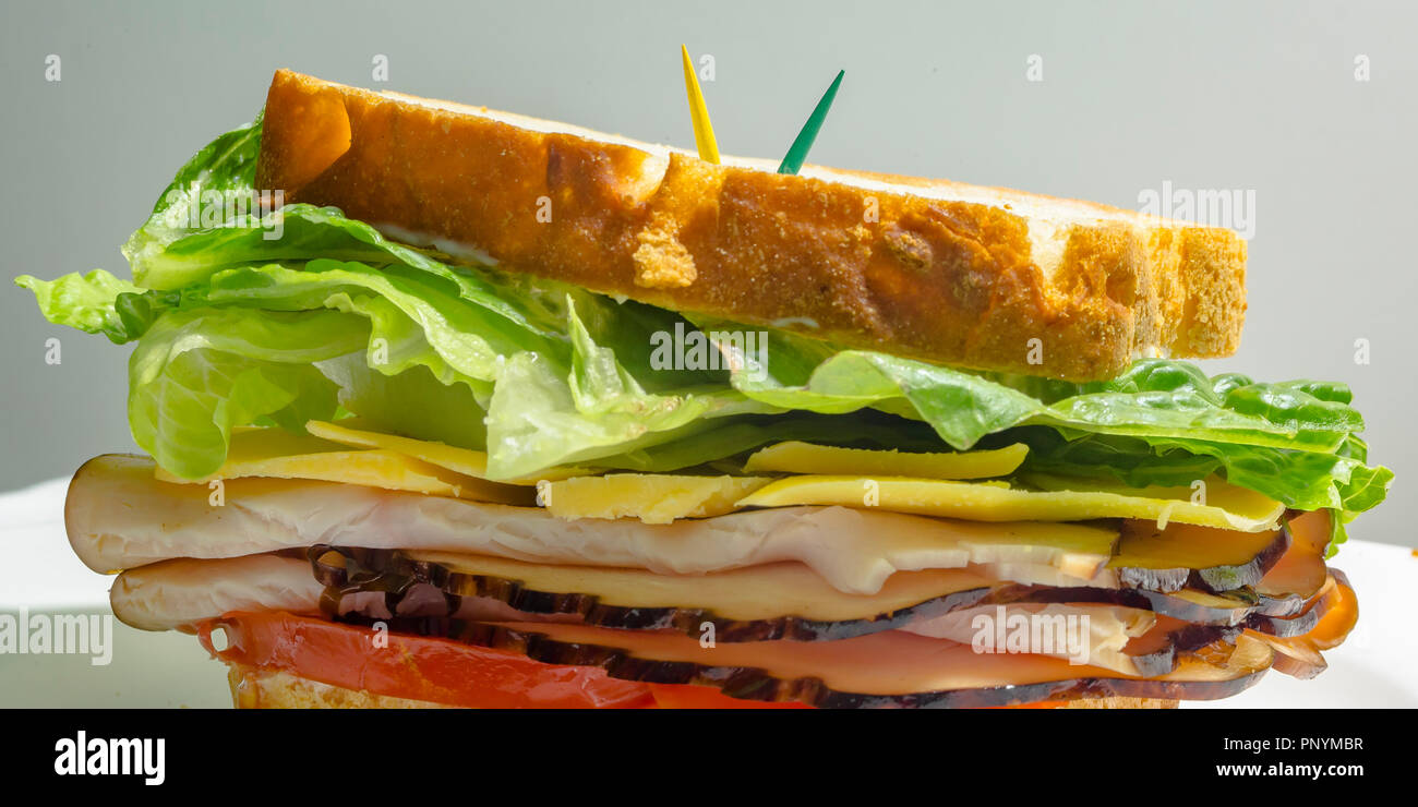 Deli sandwich with toothpicks to secure filling Stock Photo - Alamy