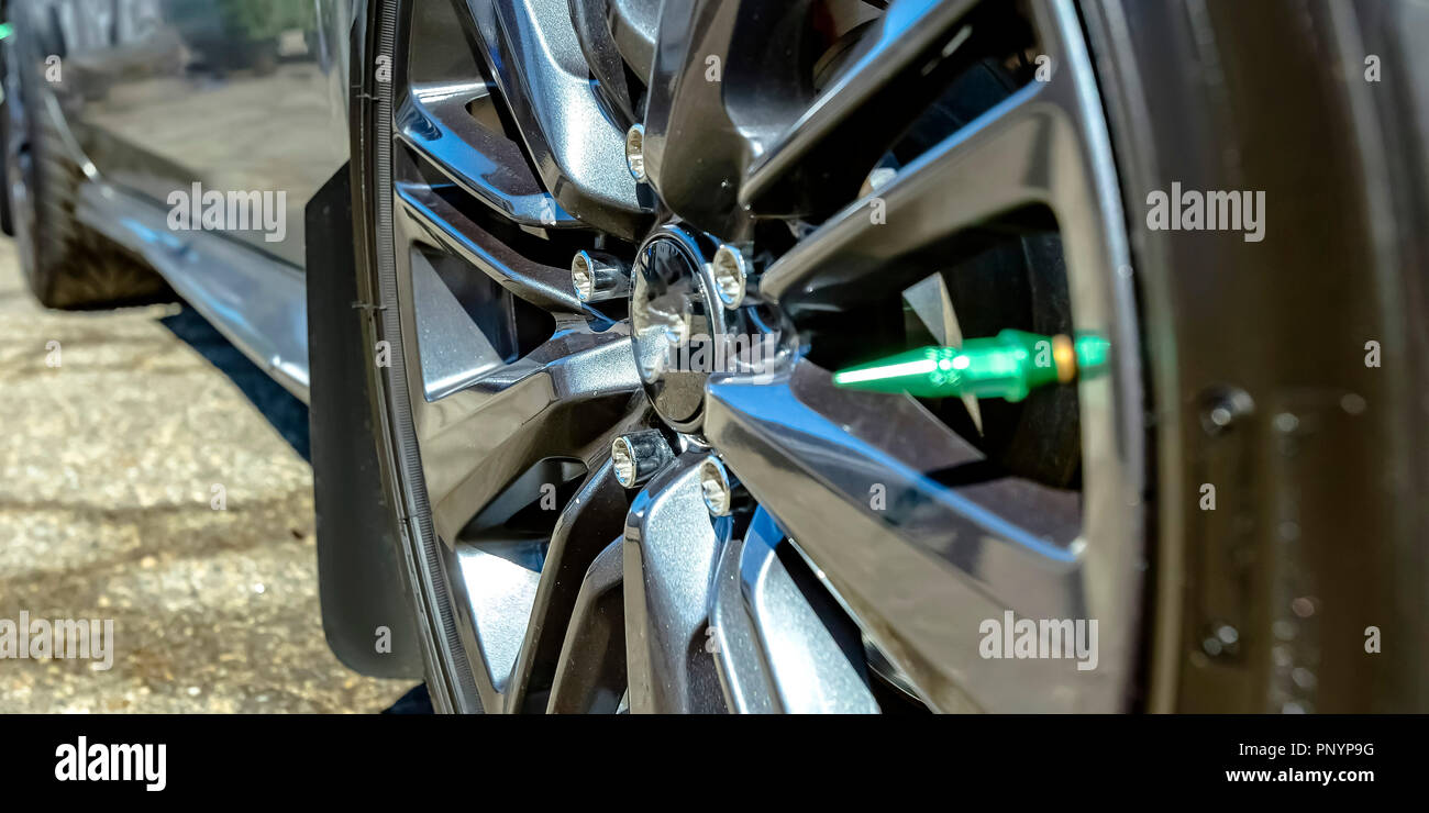Wheel rim with silver spokes and spike Stock Photo - Alamy