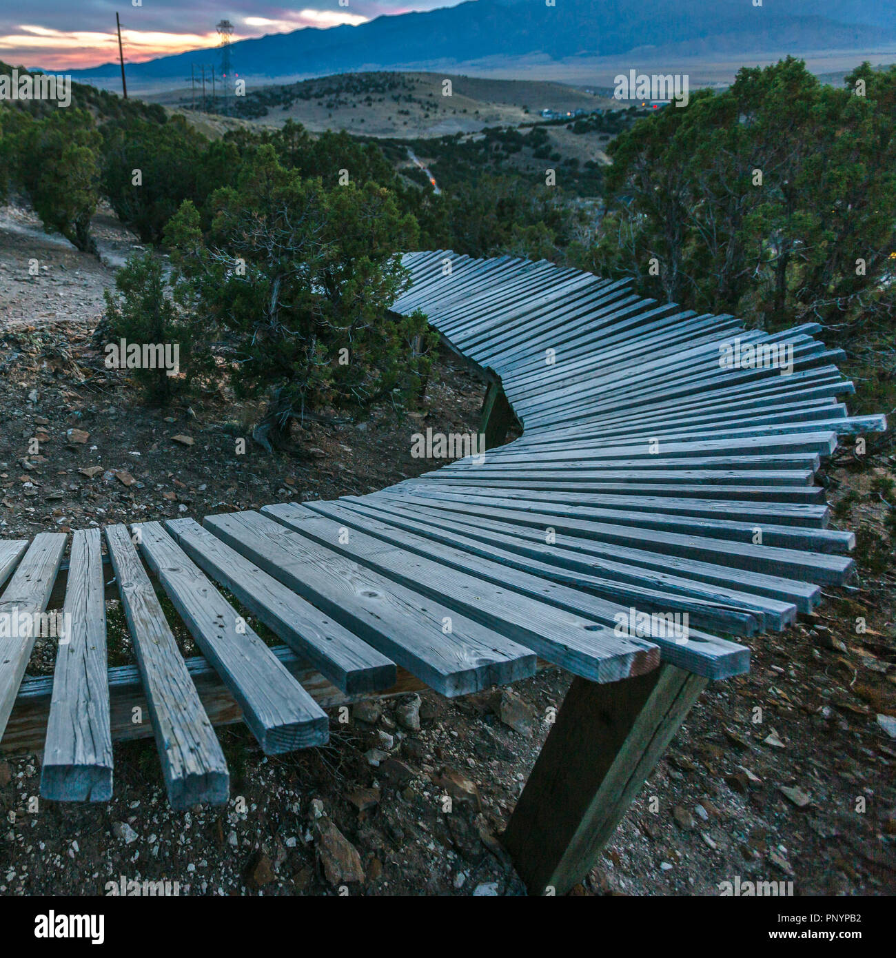 Wooden path with view of vast terrain and mountain Stock Photo - Alamy