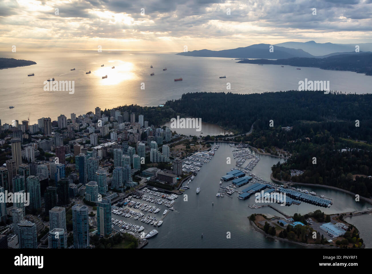 Aerial view of Coal Harbour during a vibrant summer sunset. Taken in ...