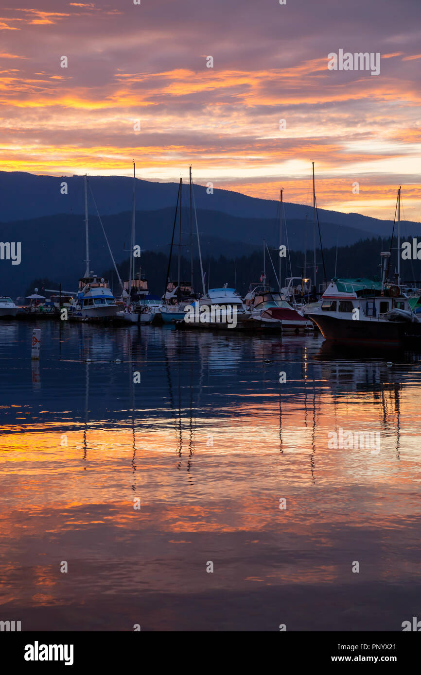 Beautiful view of Deep Cove during a colorful summer sunrise. Taken in ...