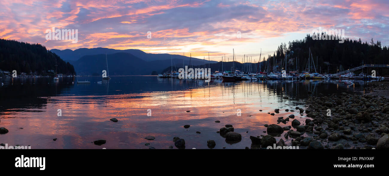Beautiful panoramic view of Deep Cove during a colorful summer sunrise ...