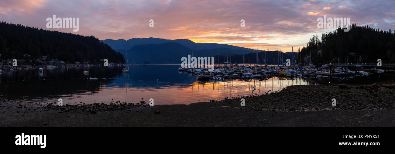 Beautiful panoramic view of Deep Cove during a colorful summer sunrise ...