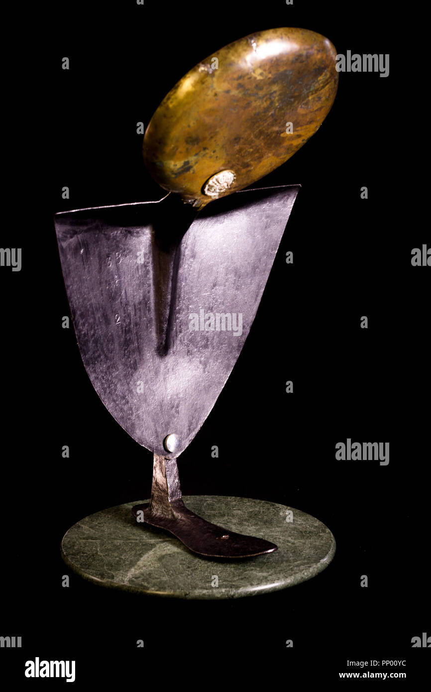 Modern sculpture made with recycled materials. Similar to human ...
