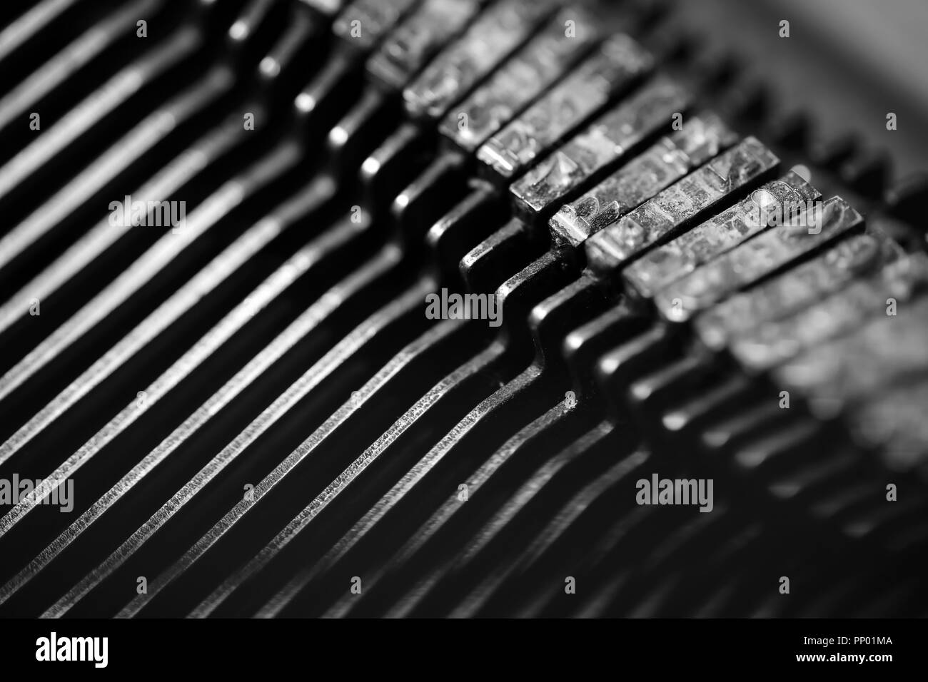Different small metal elements of an old typewriter Stock Photo - Alamy