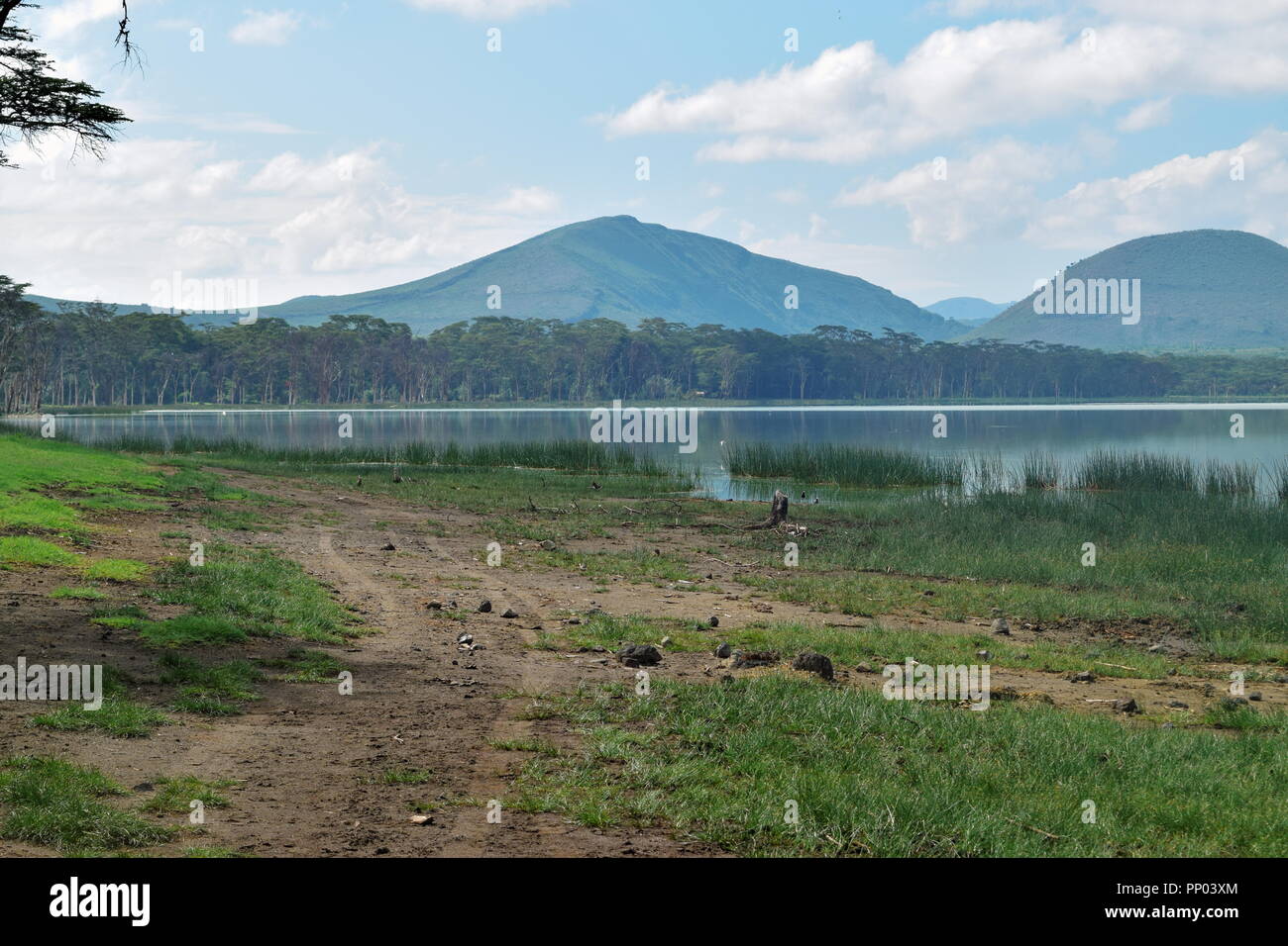 Hiking Sleeping warrior Hill at the shores of Lake Elementaita ...