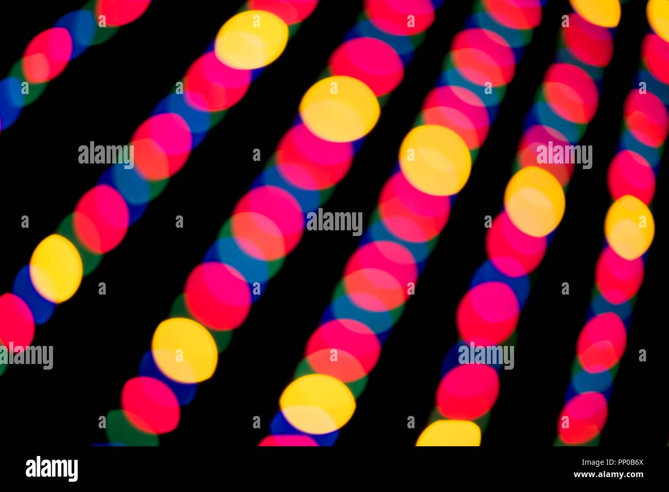 Light trails from moving camera capturing Christmas lights at night ...