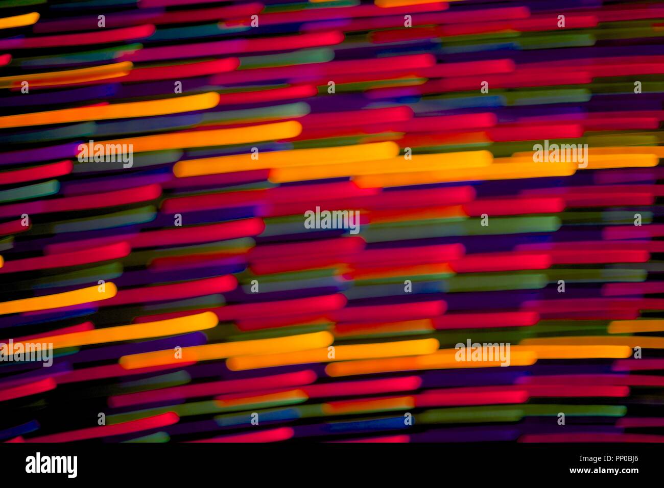 Light trails from moving camera capturing Christmas lights at night ...