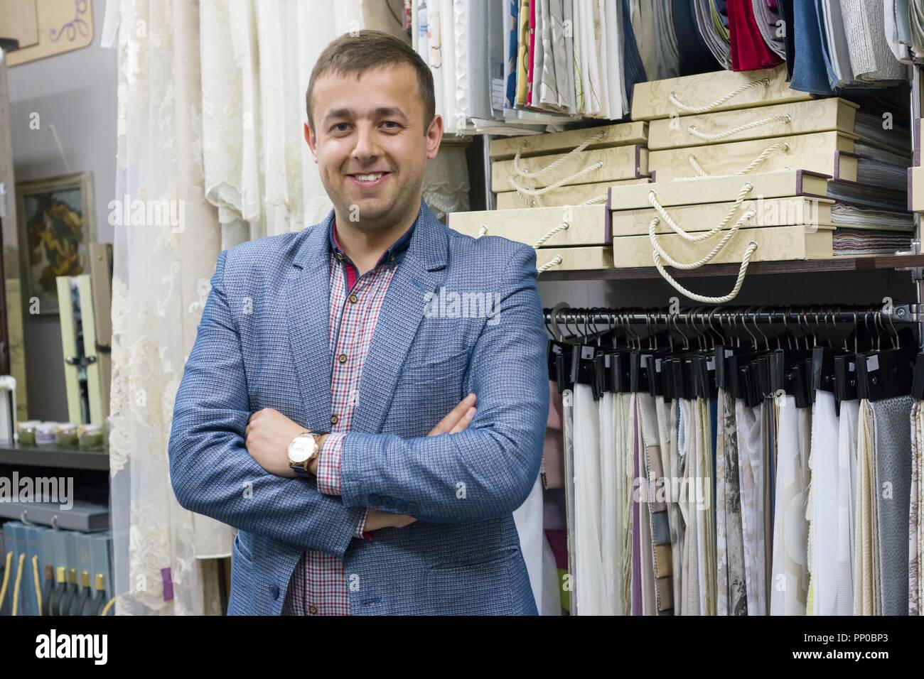 Male shop assistant clothes shop hi-res stock photography and images ...