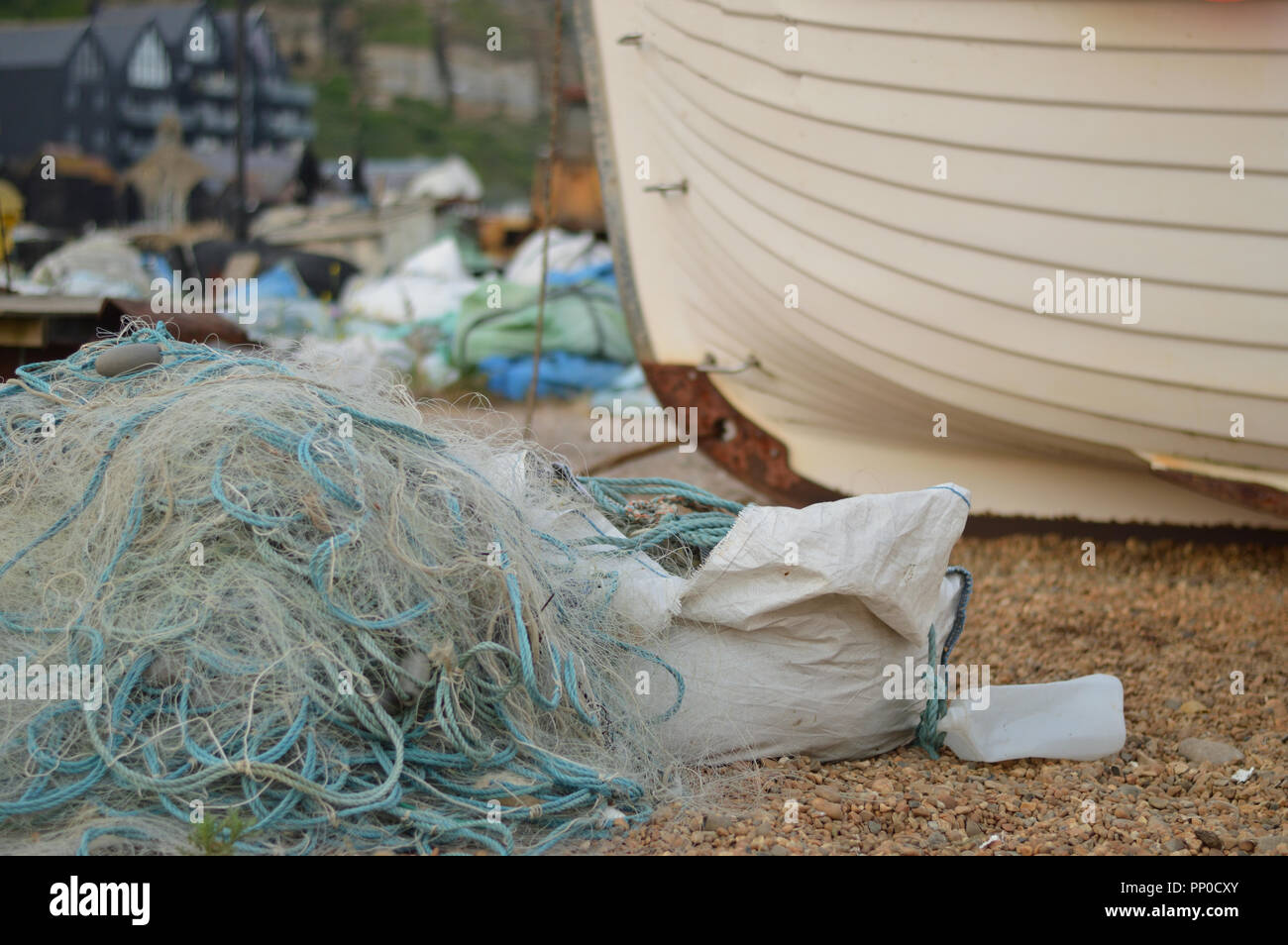 Fishing nets with boat Stock Photo - Alamy