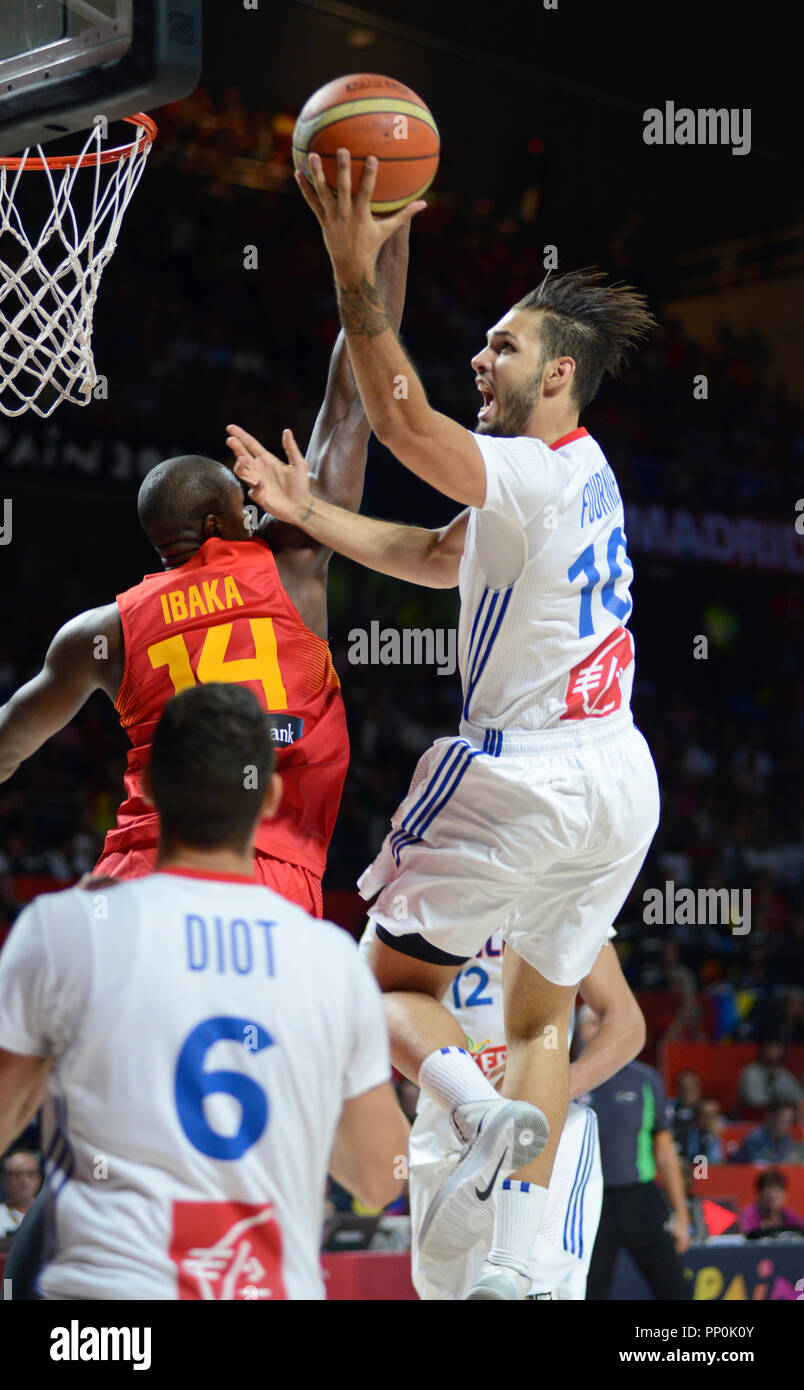 Evan Fournier (France) scoring against Serge Ibaka (Spain). FIBA World ...