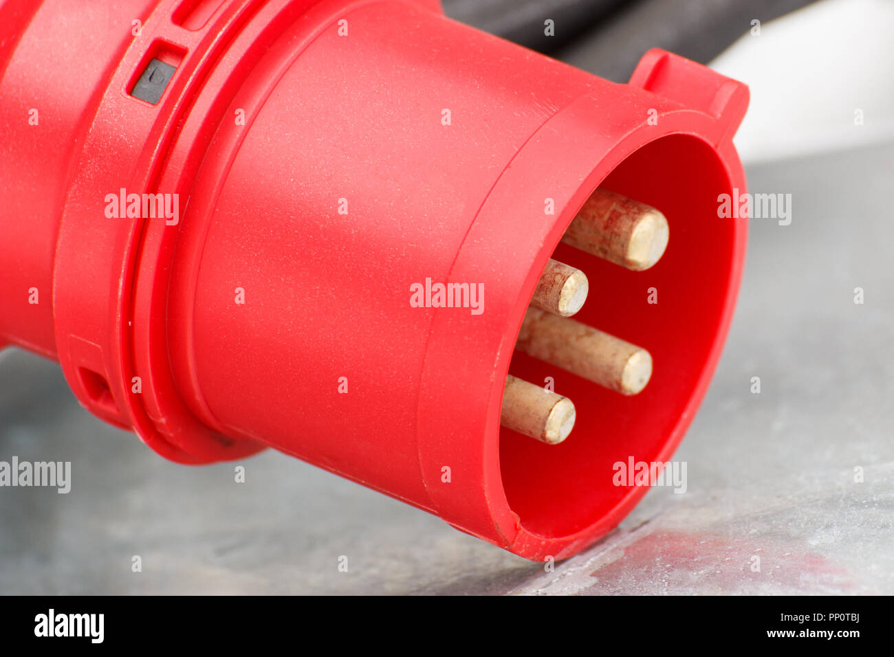 Closeup of industrial electric plug of machinery with cable, technology ...