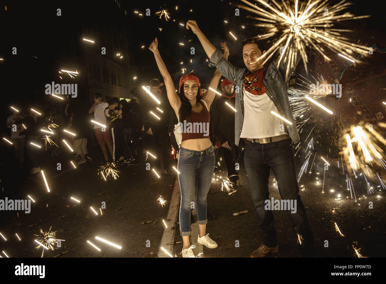 Barcelona, Spain. 22 September, 2018: Tourists pose for a photo as ...