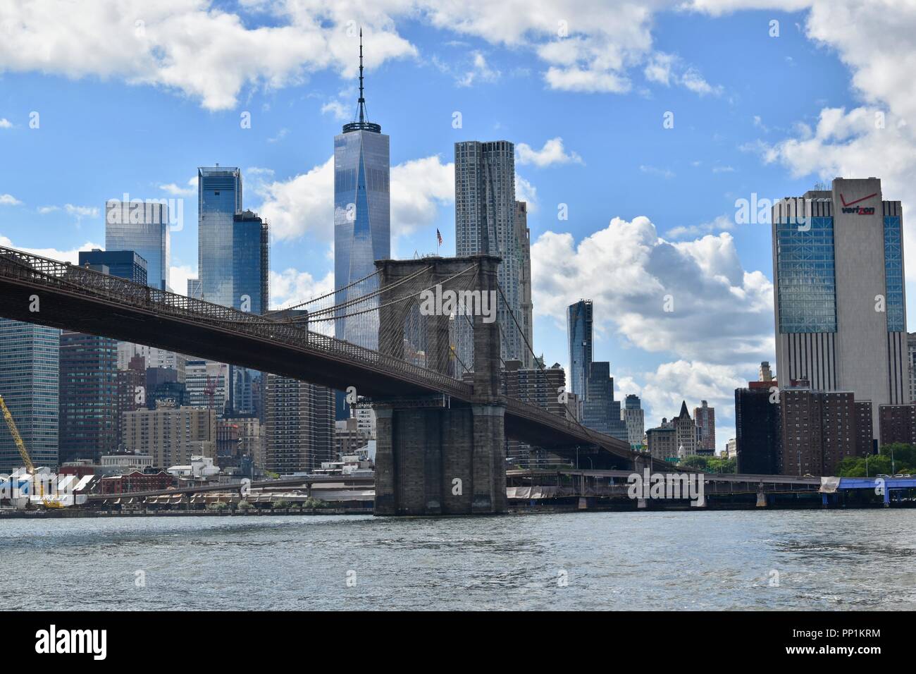 The iconic Brooklyn Bridge spanning the East River between Lower ...