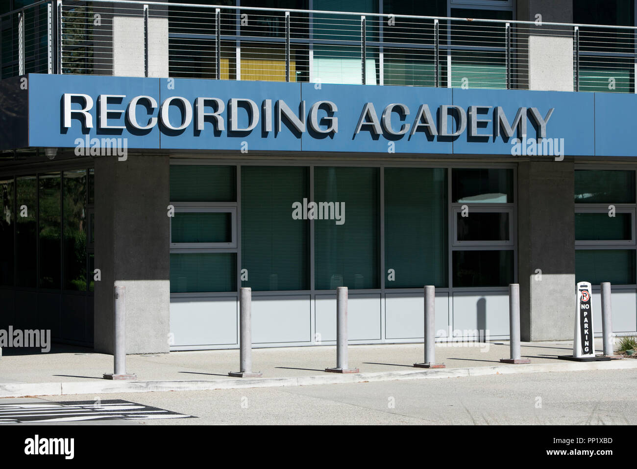 A logo sign outside of the headquarters of The Recording Academy in ...