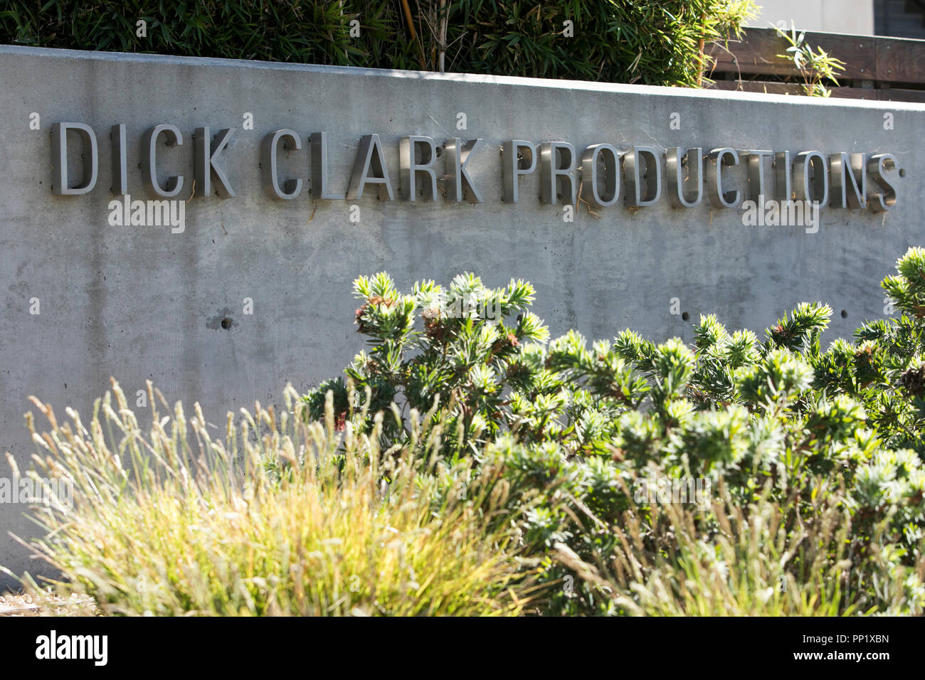 A logo sign outside of the headquarters of Dick Clark Productions in ...