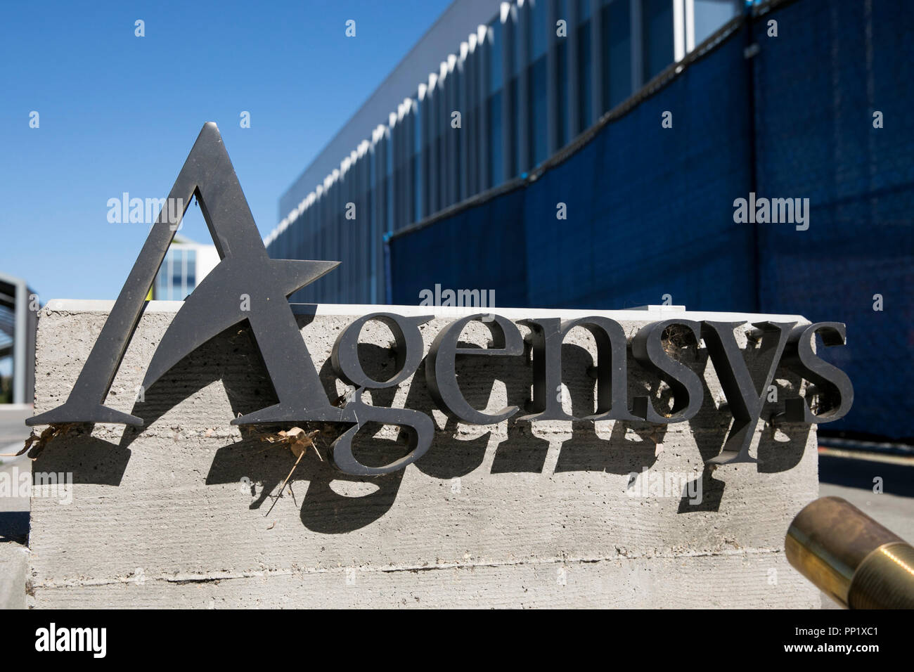A logo sign outside of the former headquarters of Agensys in Santa ...