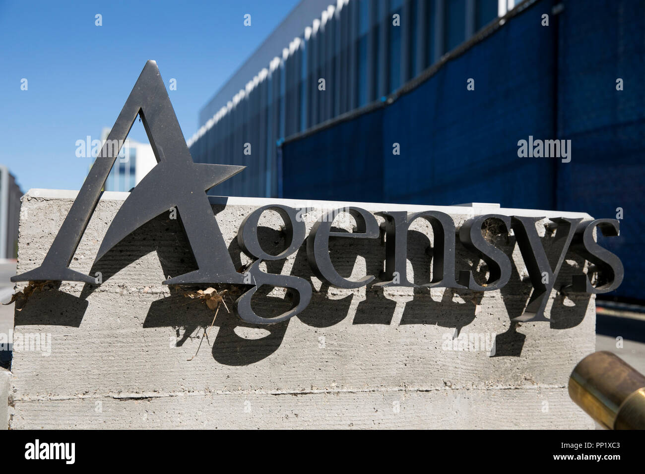 A logo sign outside of the former headquarters of Agensys in Santa ...