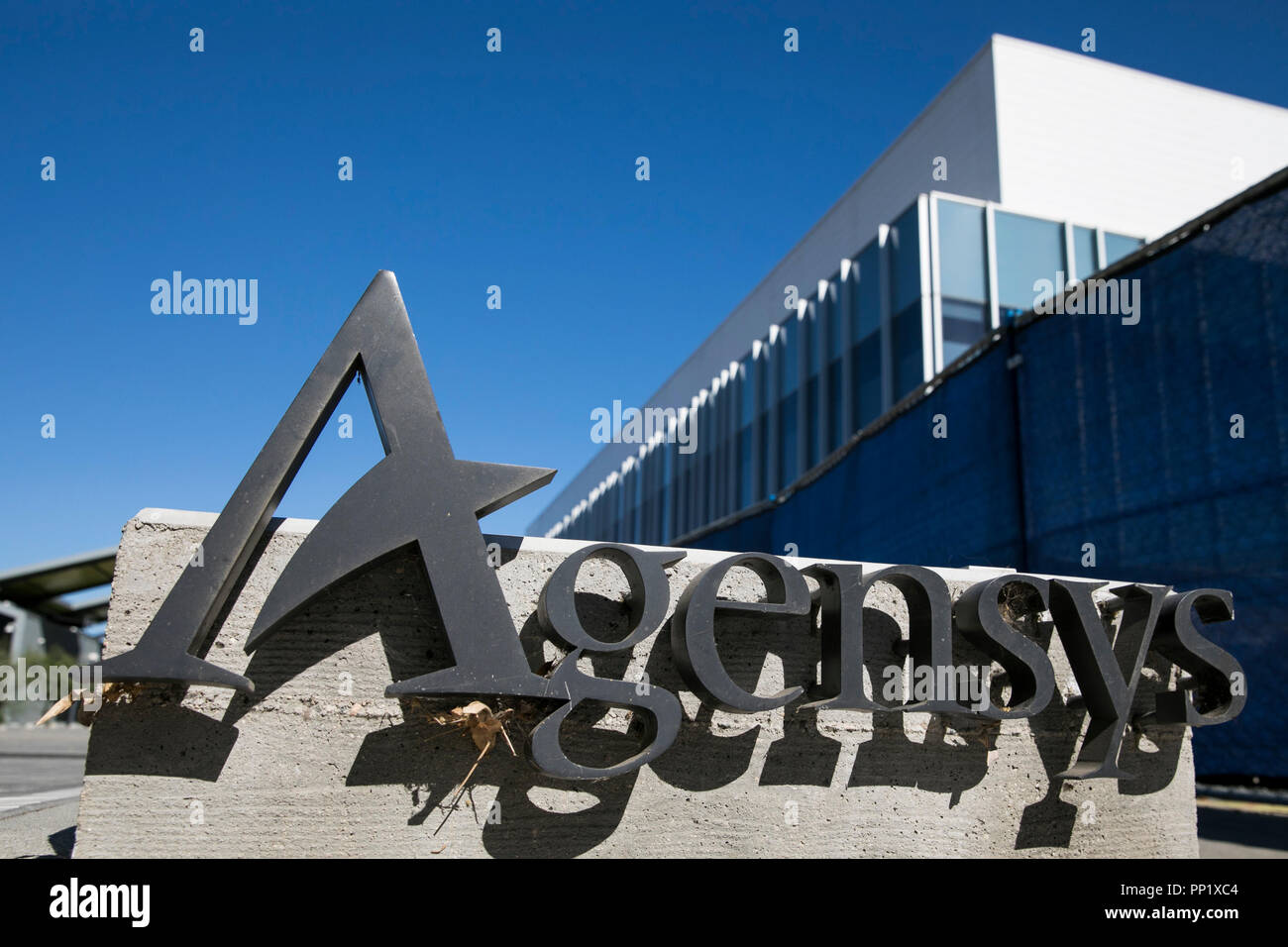 A logo sign outside of the former headquarters of Agensys in Santa ...