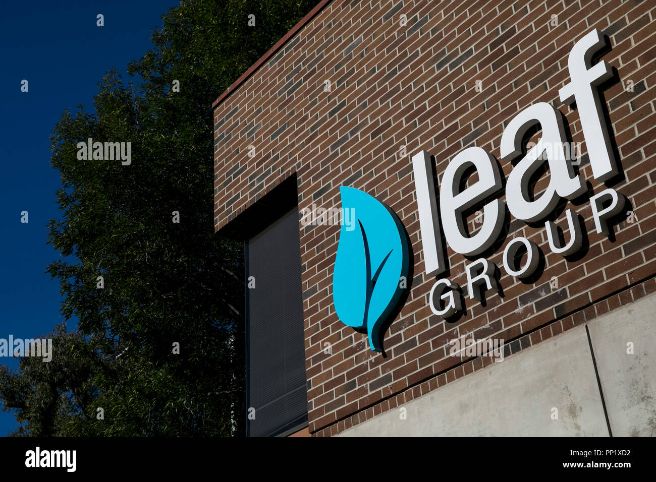 A logo sign outside of the headquarters of the Leaf Group in Santa ...