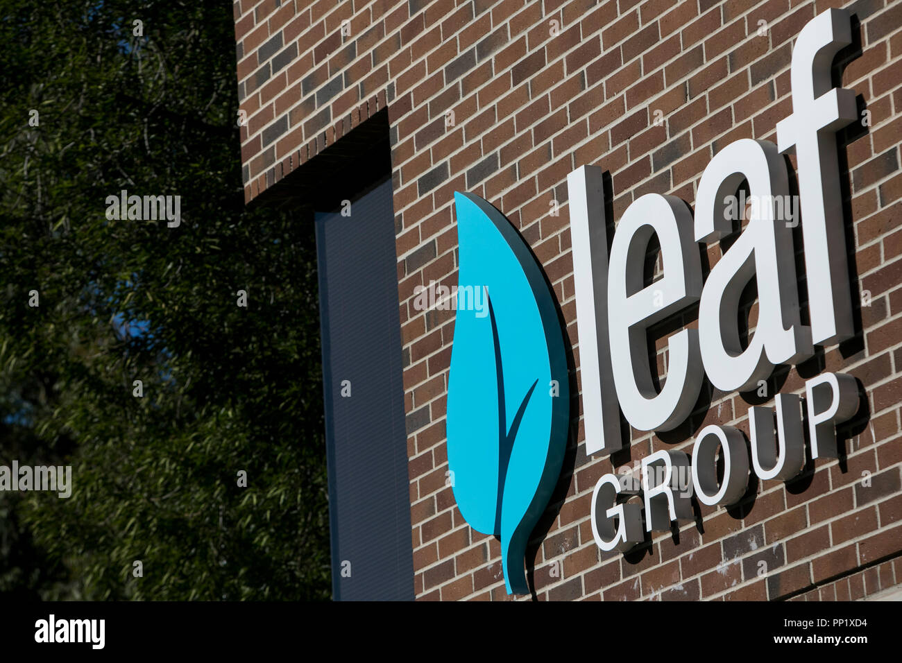 A logo sign outside of the headquarters of the Leaf Group in Santa ...