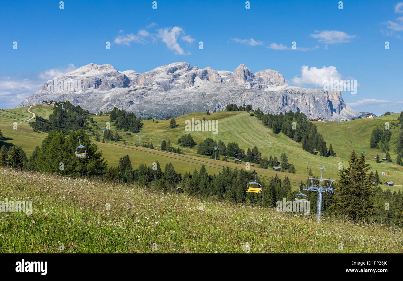 Alta Badia ski area in the summer with the Sella Group mountains in the ...