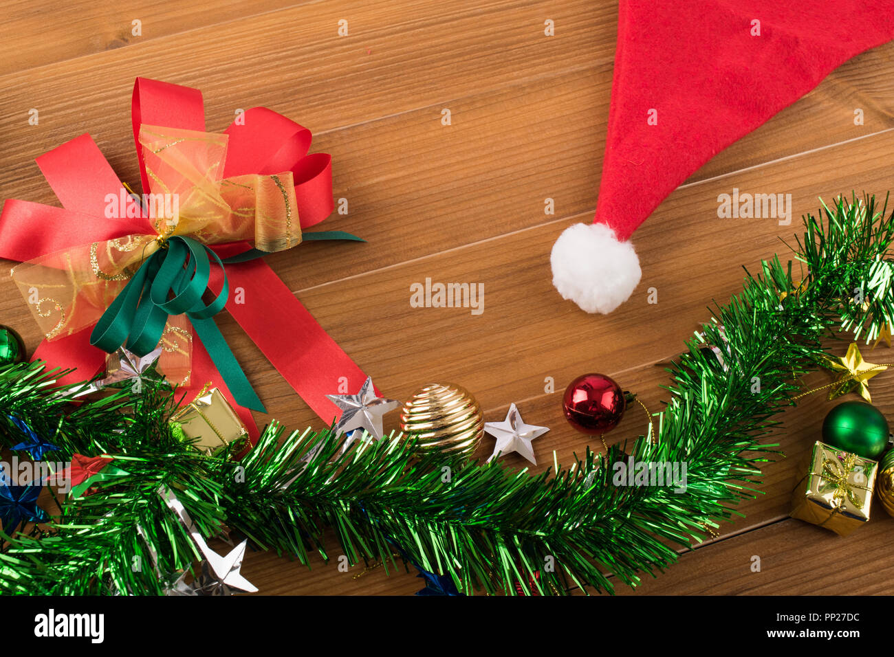 Christmas border design on the wooden background Stock Photo - Alamy